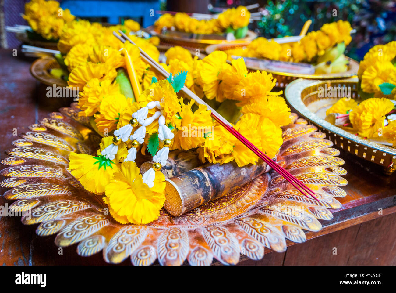 Offering flowers in temple hi-res stock photography and images - Alamy