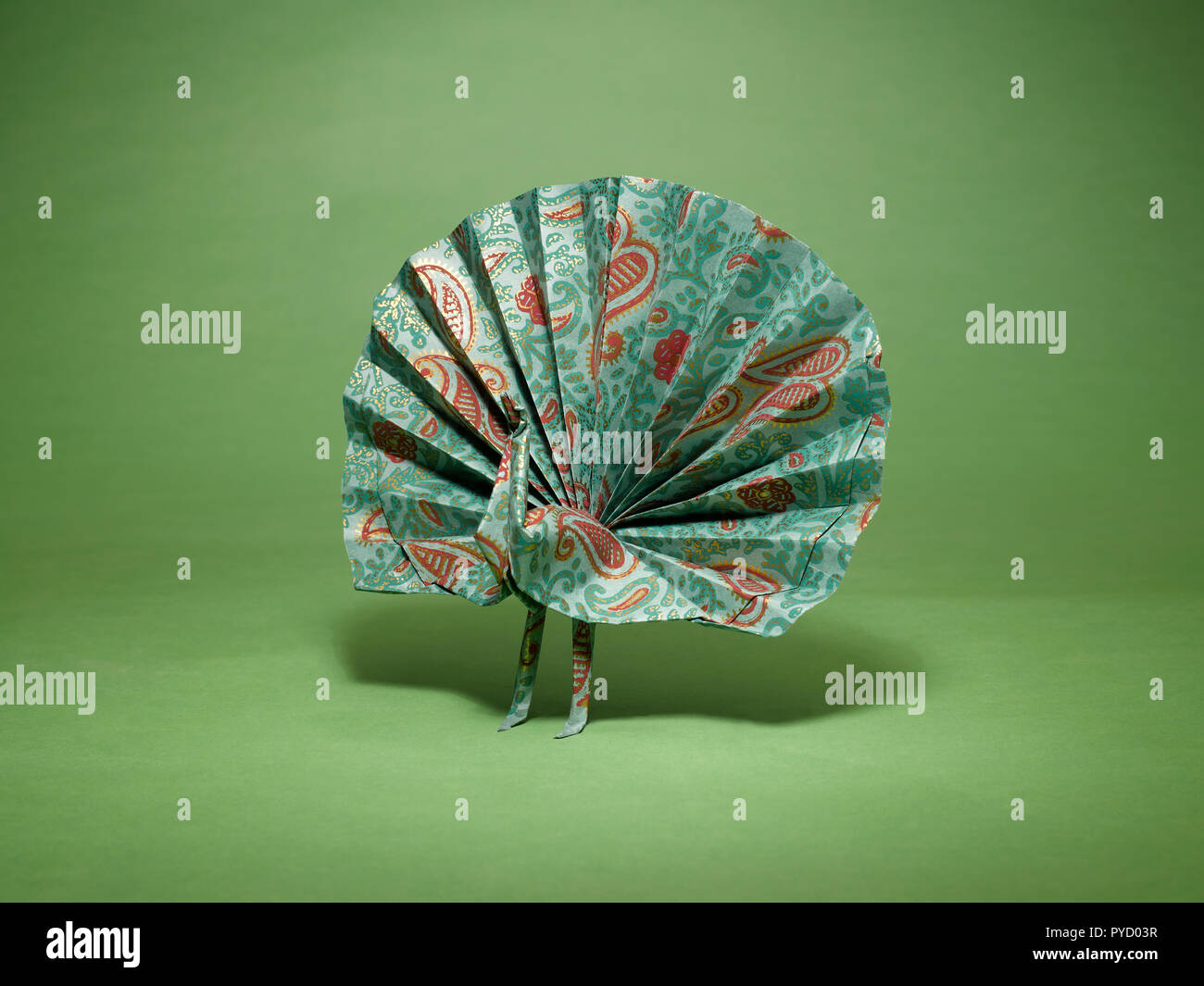 A STILL LIFE OF A PAPER PEACOCK MADE WITH THE ART OF ORIGAMI Stock ...