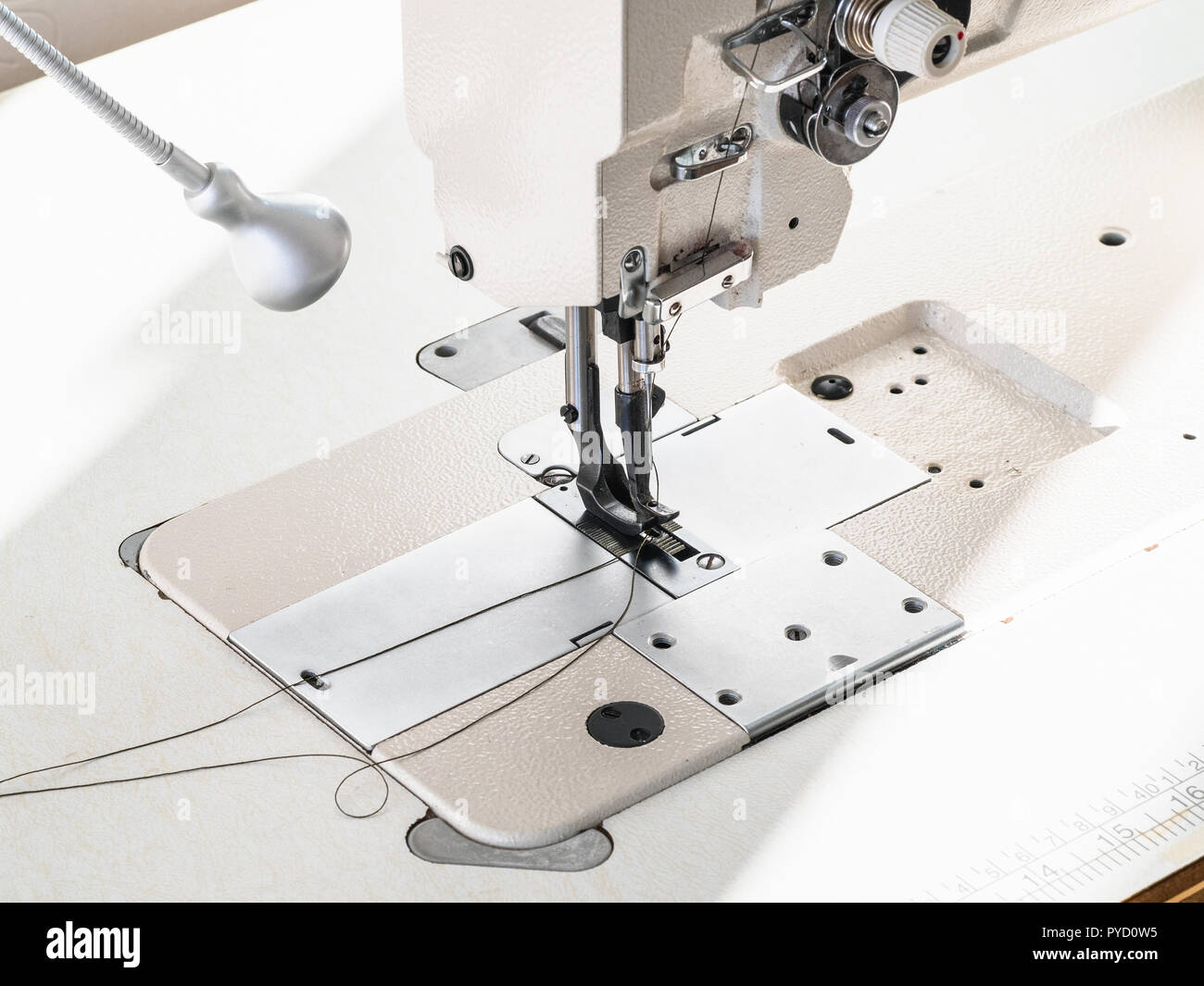 workshop of making textile and leather travel bag - thread in the ...