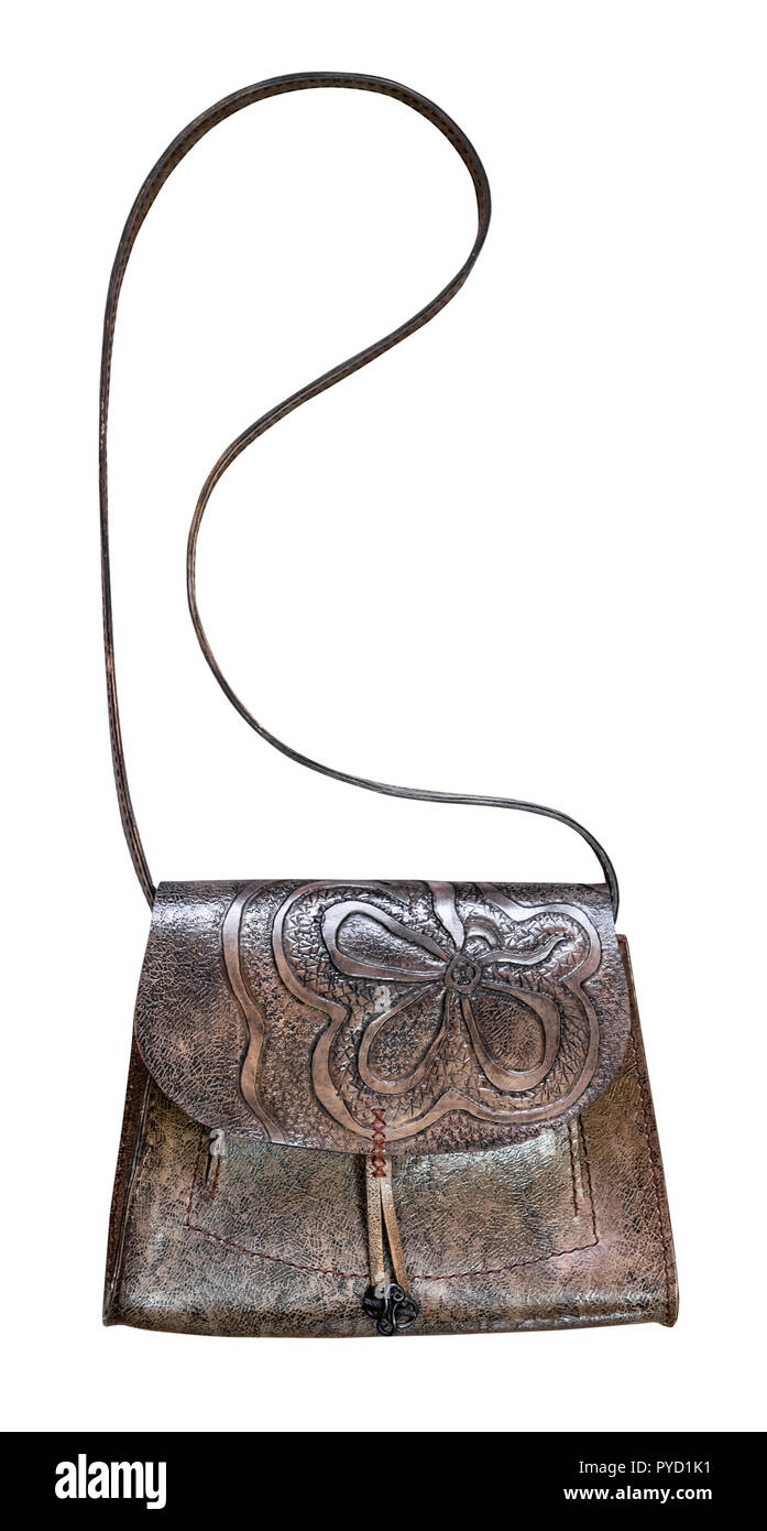 hand made carved leather shoulder bag cut out on white background Stock ...