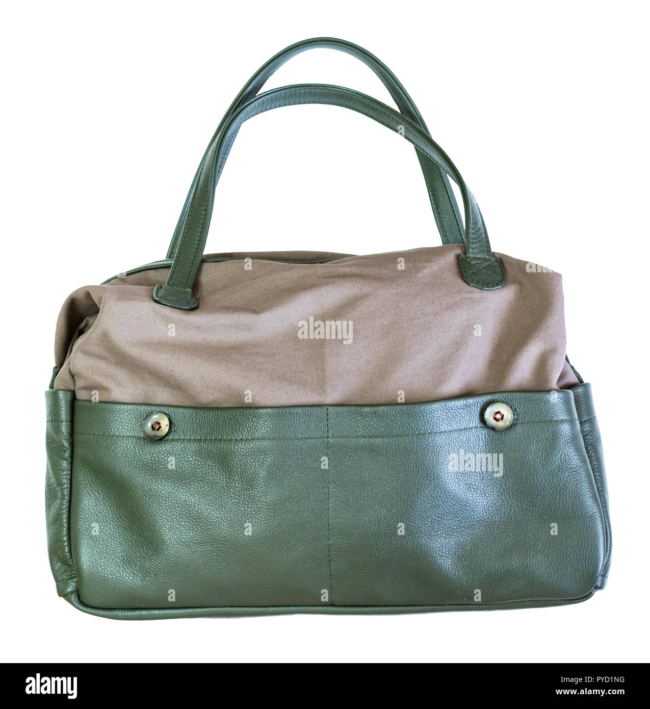 new handmade combined textile and leather handbag cut out on white ...