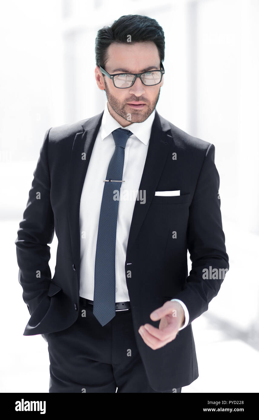 beautiful businessman in the office background Stock Photo - Alamy