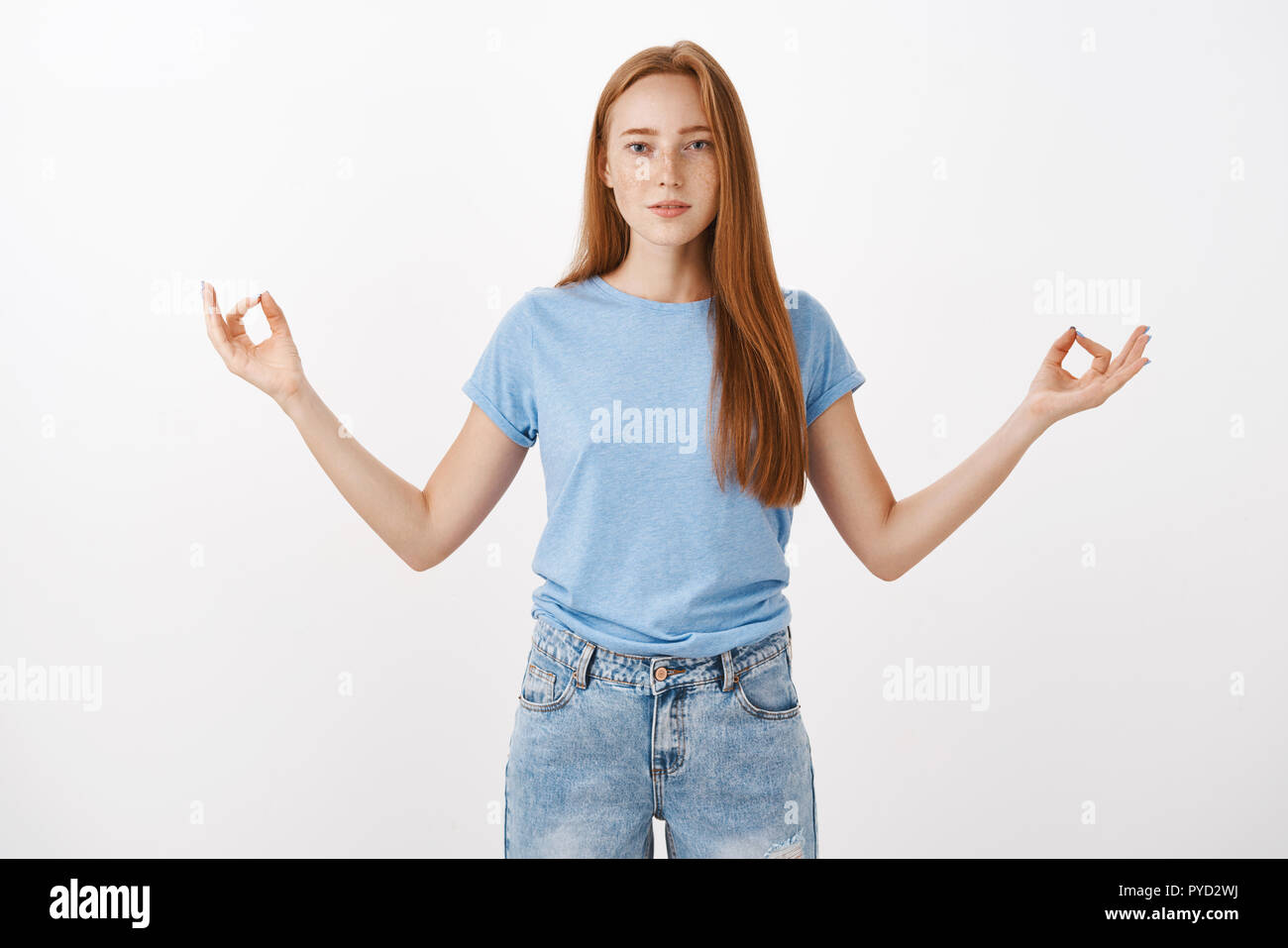 Keeping mind healthy and calm. Relaxed energized good-looking female ...