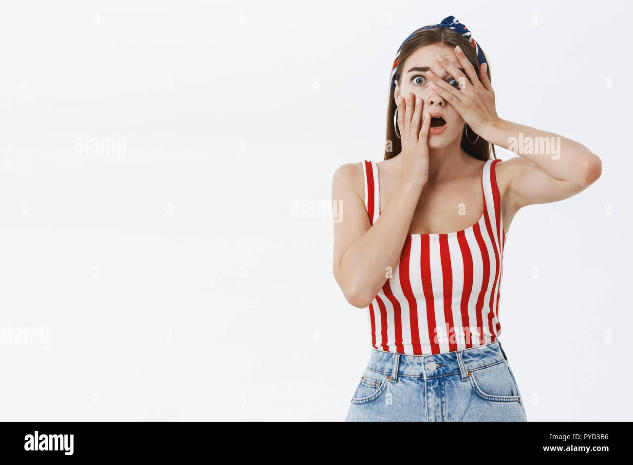 Oh no pimples covered face. Troubled and shocked fahion girl in striped ...