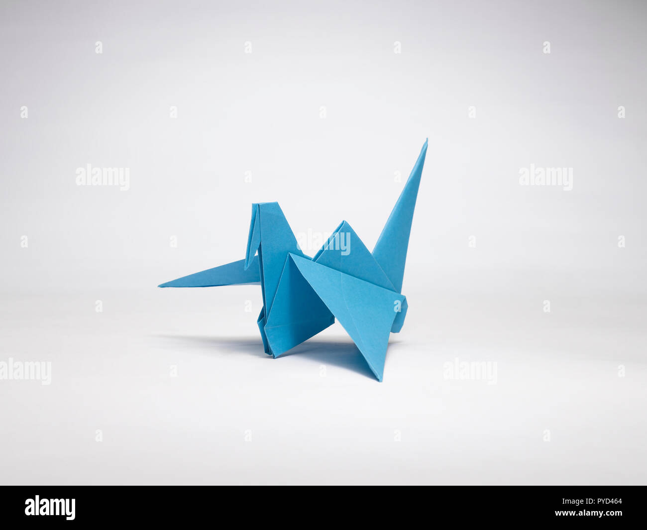 A STILL LIFE OF A PAPER CRANE MADE WITH THE ART OF ORIGAMI Stock Photo ...
