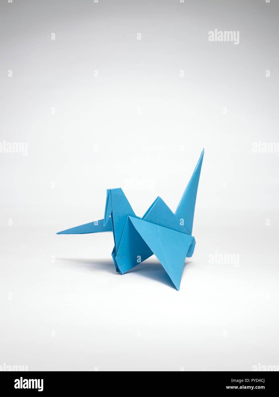 A STILL LIFE OF A PAPER CRANE MADE WITH THE ART OF ORIGAMI Stock Photo ...