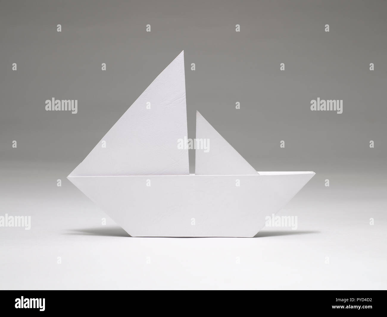 A STILL LIFE OF A PAPER SAIL BOAT MADE WITH THE ART OF ORIGAMI Stock ...