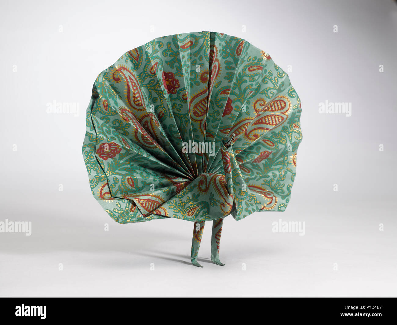 A STILL LIFE OF A PAPER PEACOCK MADE WITH THE ART OF ORIGAMI Stock ...