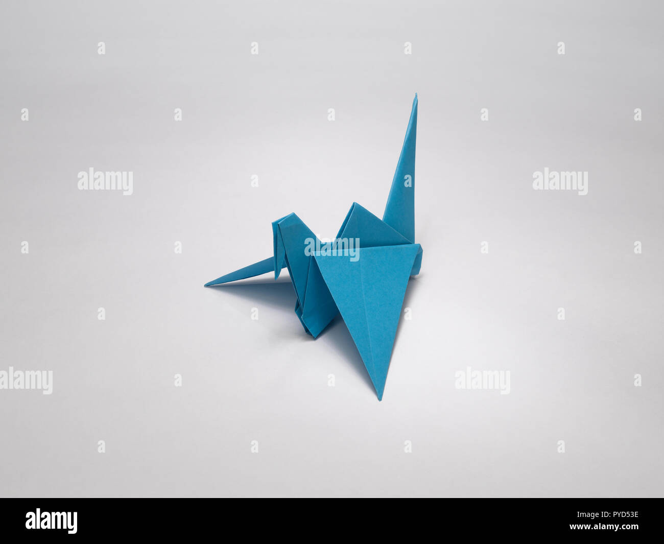 A STILL LIFE OF A PAPER CRANE MADE WITH THE ART OF ORIGAMI Stock Photo ...
