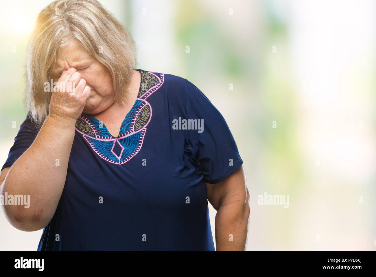 Senior plus size caucasian woman over isolated background tired rubbing ...