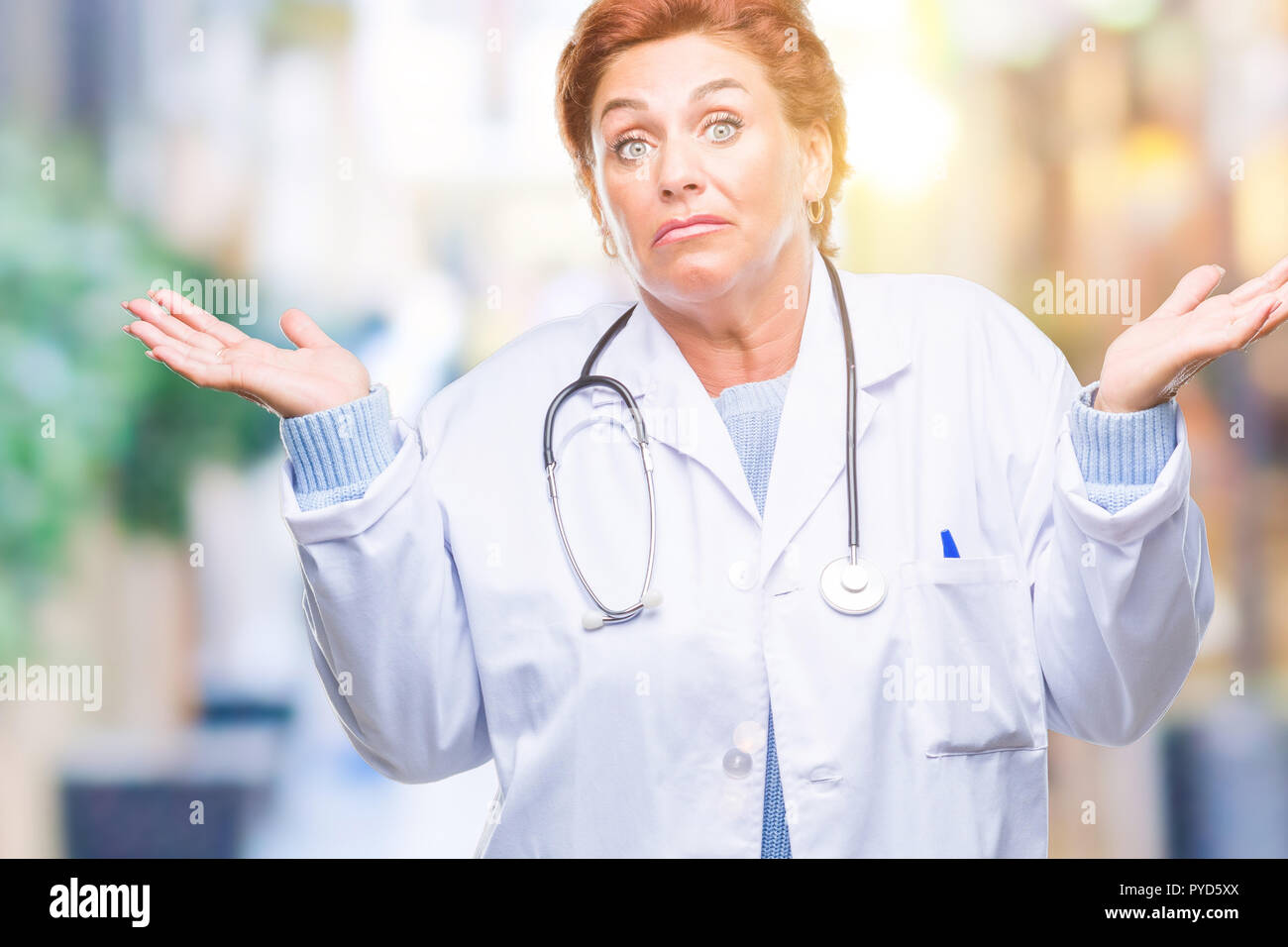Senior caucasian doctor woman wearing medical uniform over isolated ...