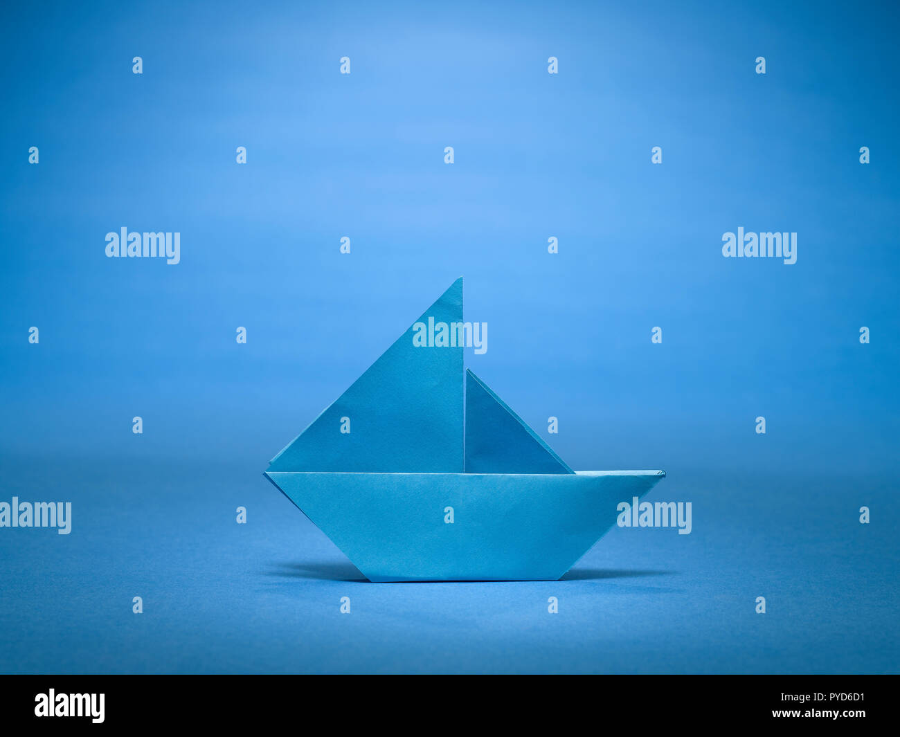 A STILL LIFE OF A PAPER SAIL BOAT MADE WITH THE ART OF ORIGAMI Stock ...