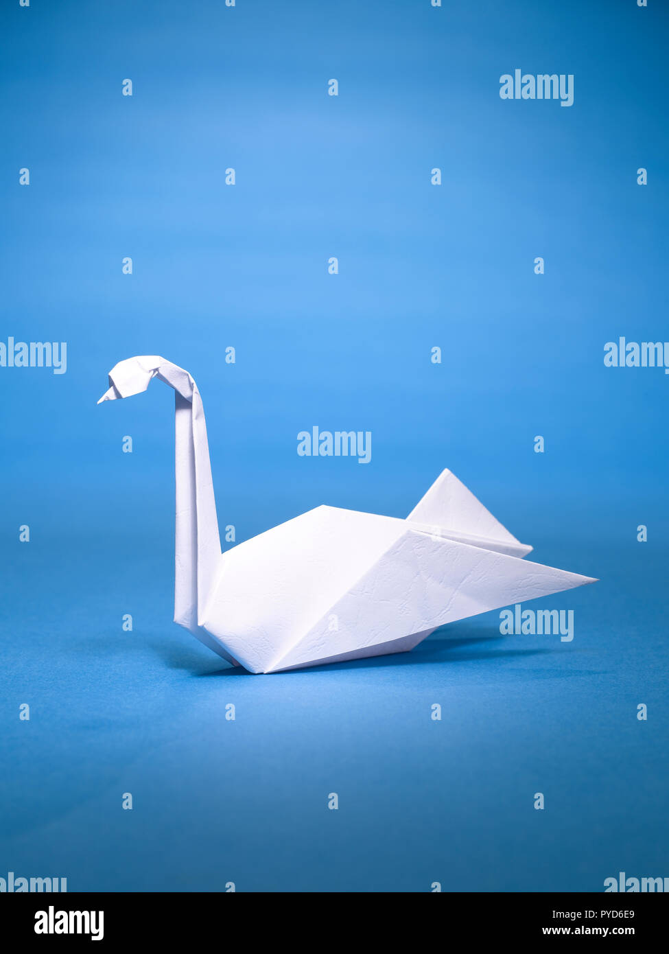 A STILL LIFE OF A PAPER SWAN MADE WITH THE ART OF ORIGAMI Stock Photo ...