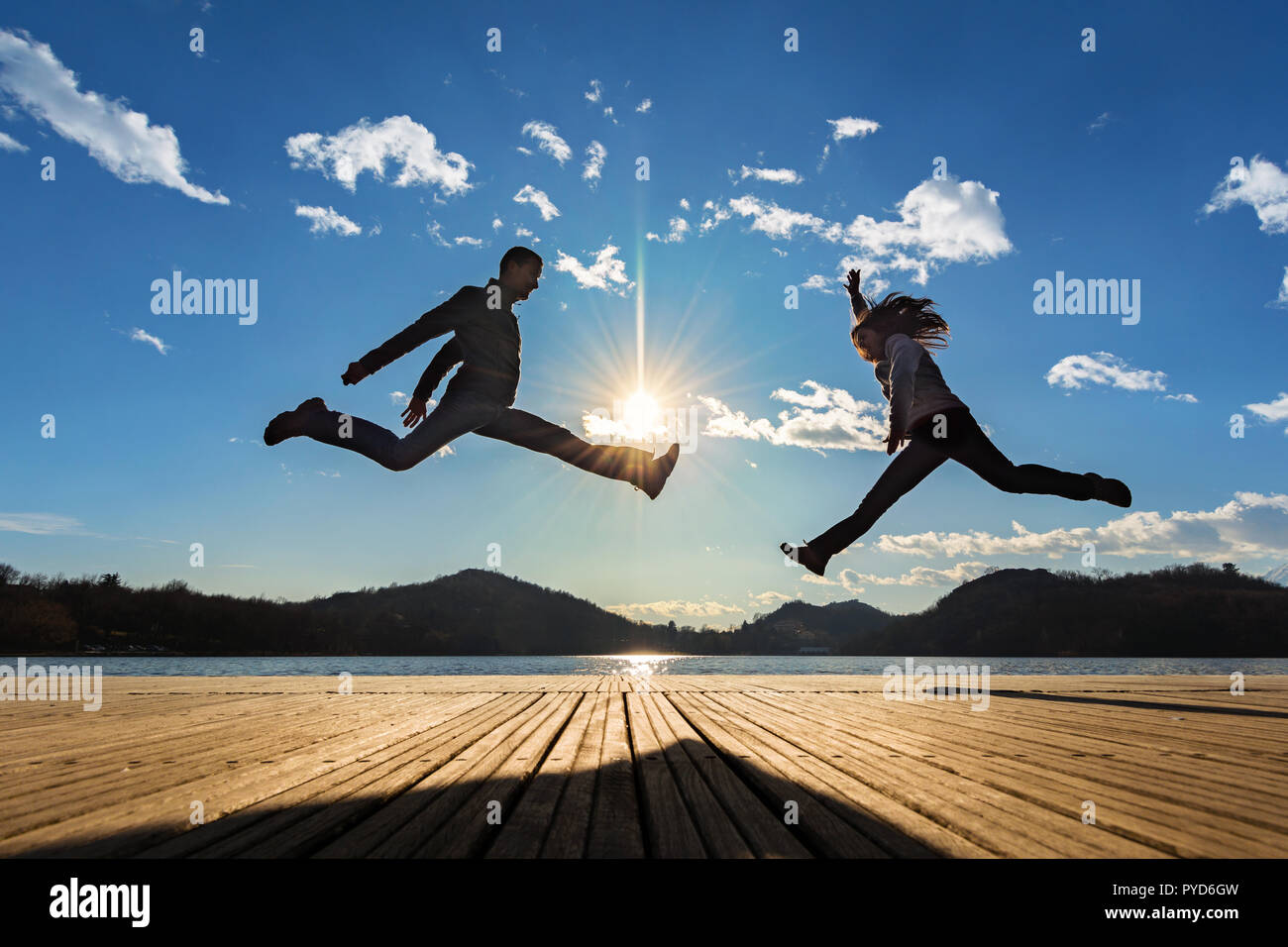 Couple Jumping Dock High Resolution Stock Photography and Images - Alamy