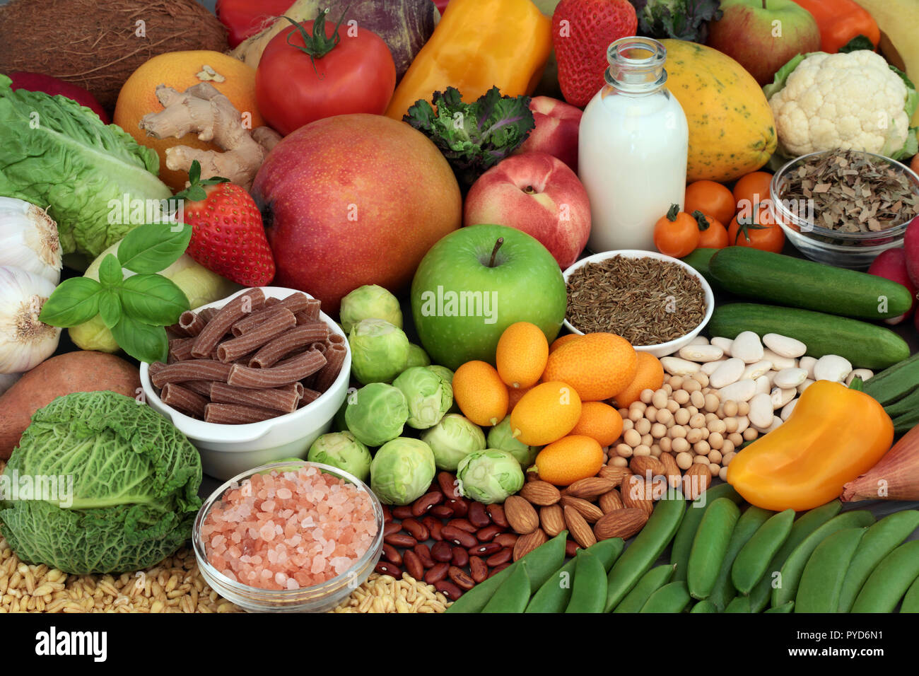 Alkaline food with fresh fruit and vegetables, nuts, herbs, spice ...