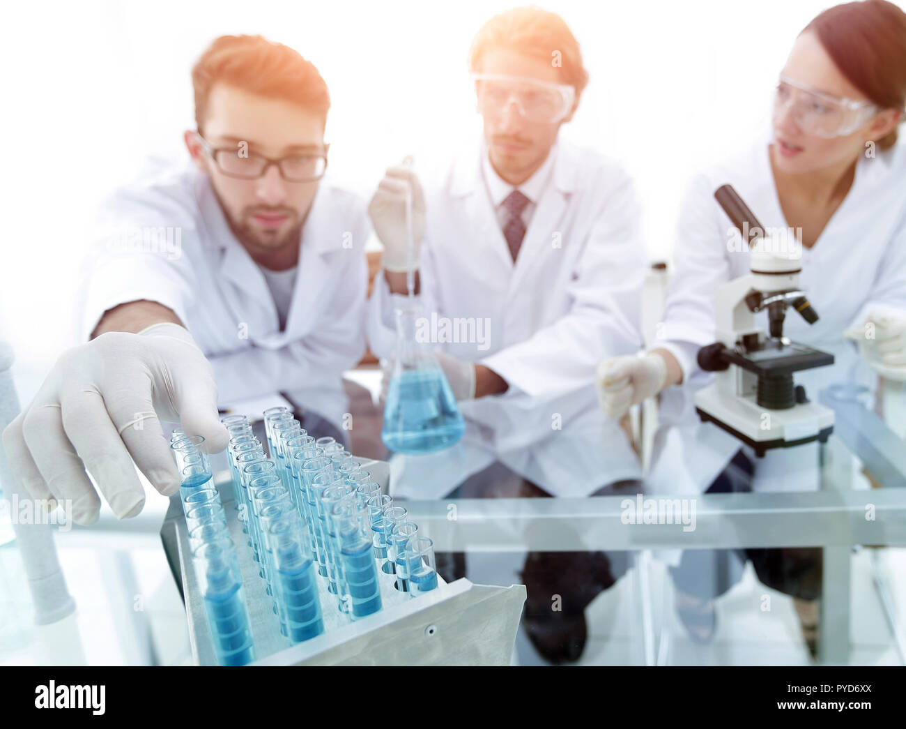 Portrait of a group of researchers conducting research Stock Photo - Alamy
