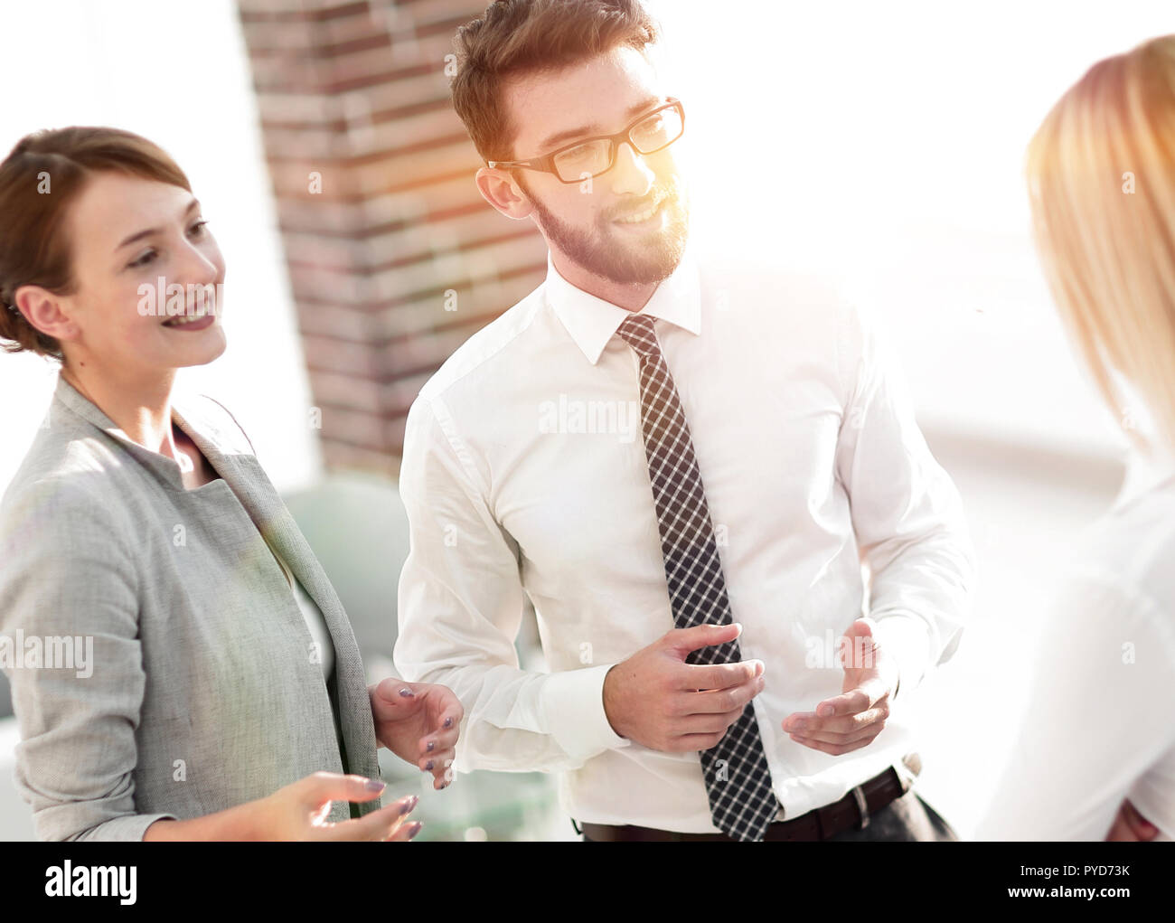 Manager and business team talking in the office Stock Photo - Alamy
