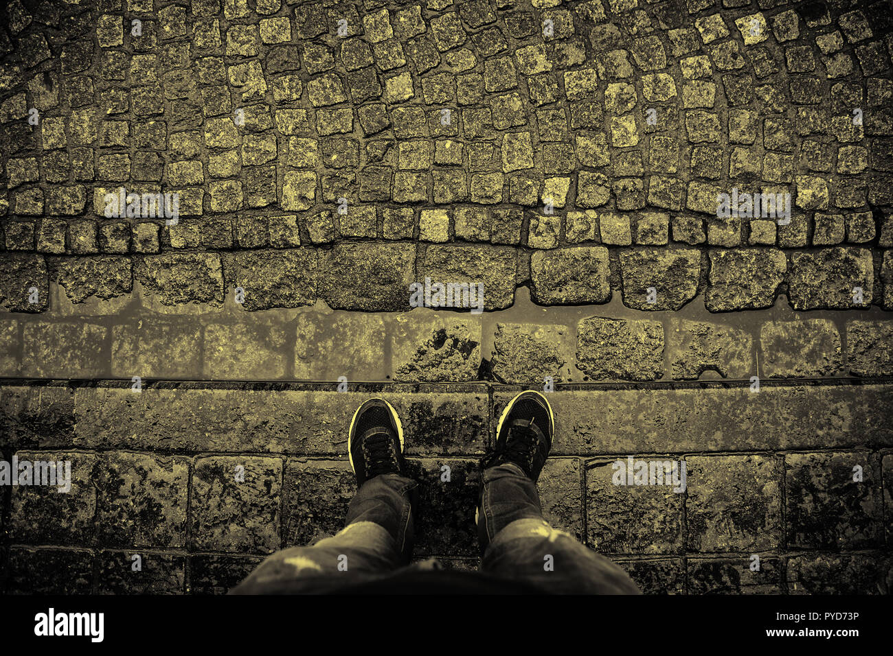 Tourist feet on cobblestones, detail of human feet in Europe Stock ...