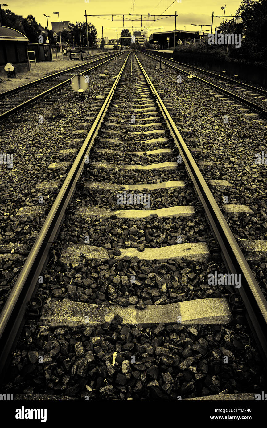 Train tracks in a station, transport detail by rails, trip Stock Photo ...
