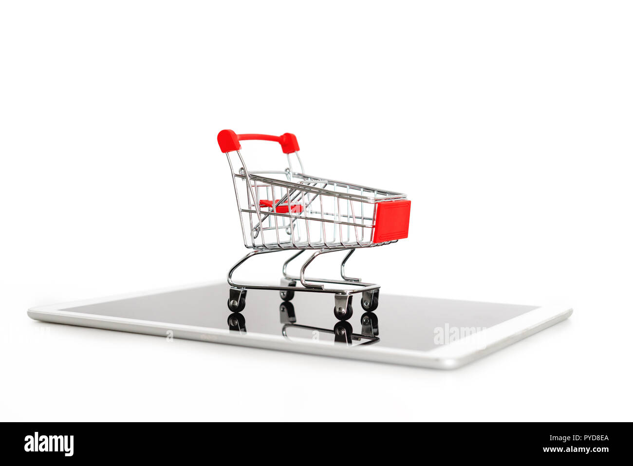 Empty shopping cart on digital tablet, isolated on white background ...