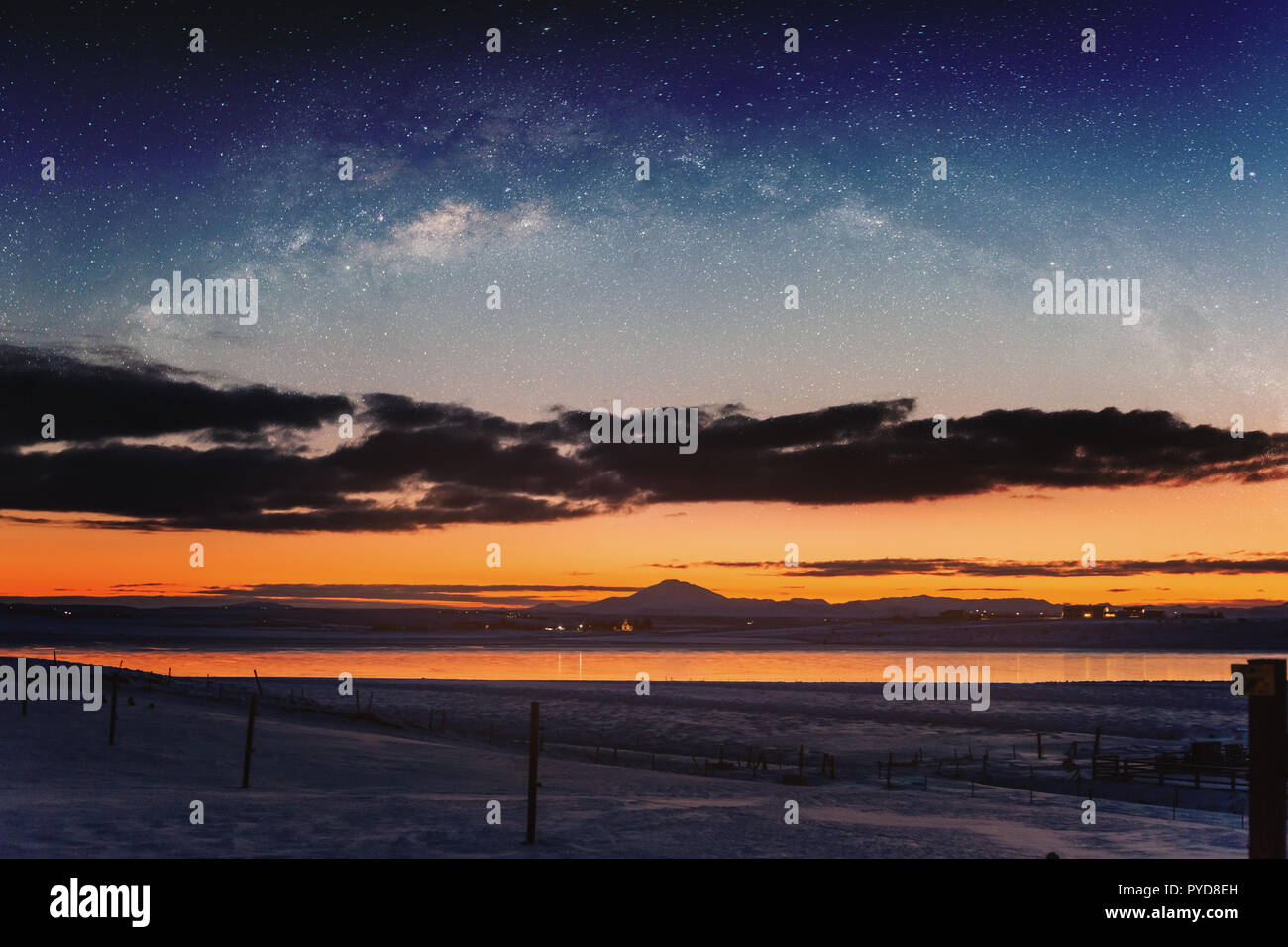 Panoramic winter landscape in sunrise with double exposure night sky ...