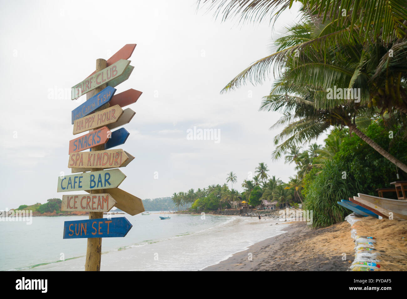 Arrows - direction signs nailed to the post Stock Photo - Alamy