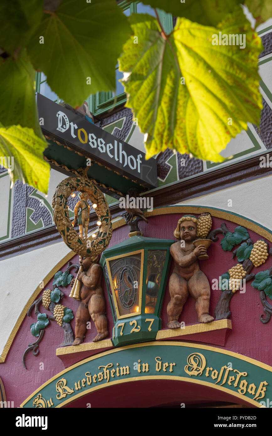 Restaurant sign in Drosselgasse, Rüdesheim, Rhineland Stock Photo - Alamy