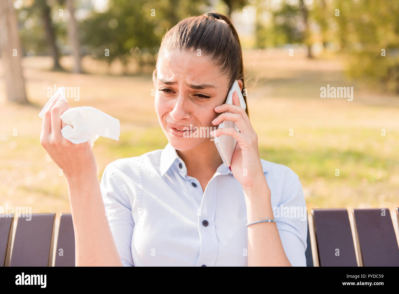 Mobile phone sad pain hi-res stock photography and images - Alamy