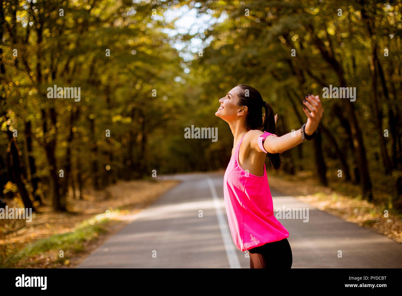 Female runner during outdoor workout in beautiful autumn mountain ...