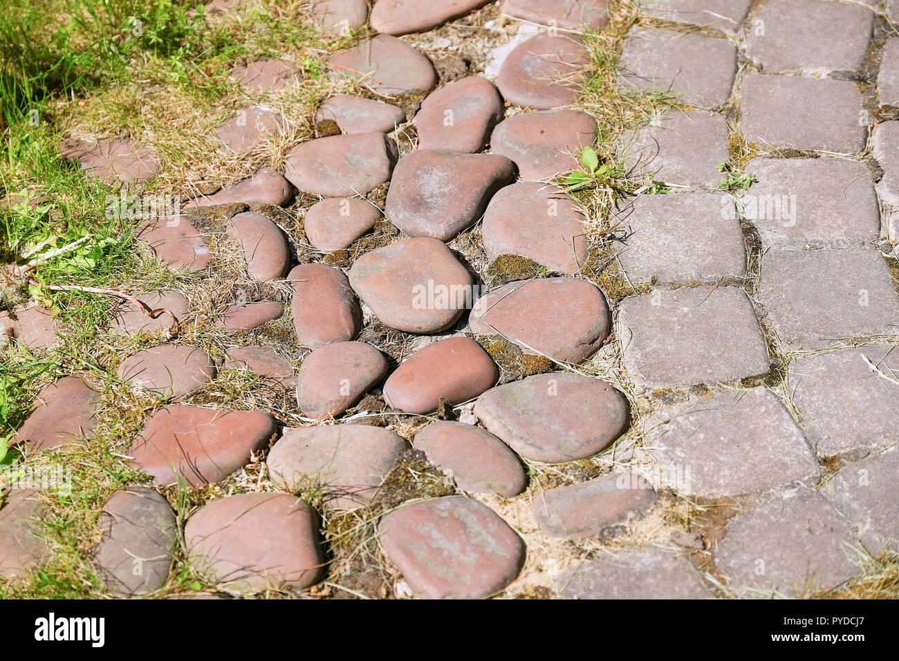 paving stones at the porch of the house. Power bricks are arranged in a ...