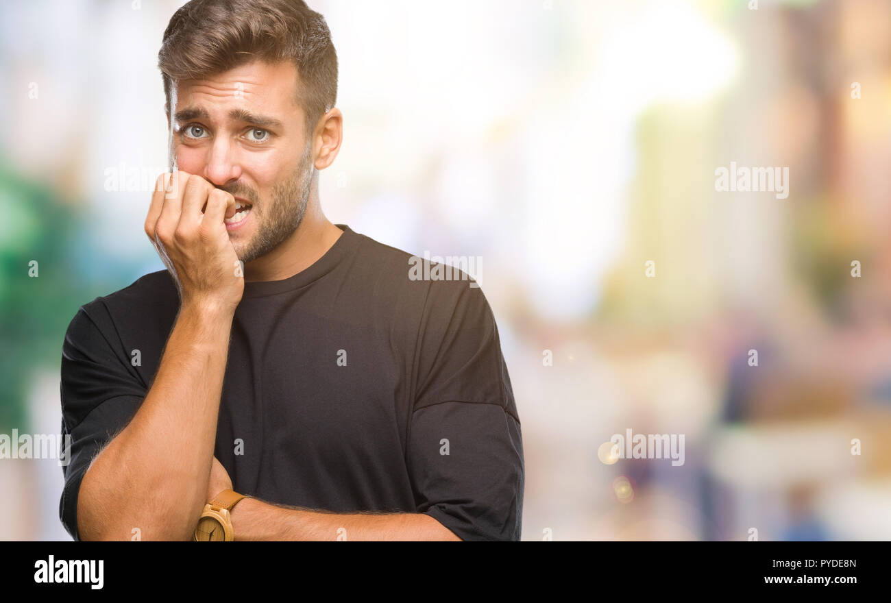 Young handsome man over isolated background looking stressed and ...