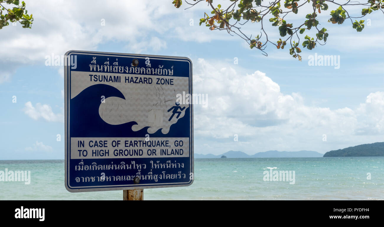 Tsunami Hazard zone sign with beach and islands in the background Stock ...