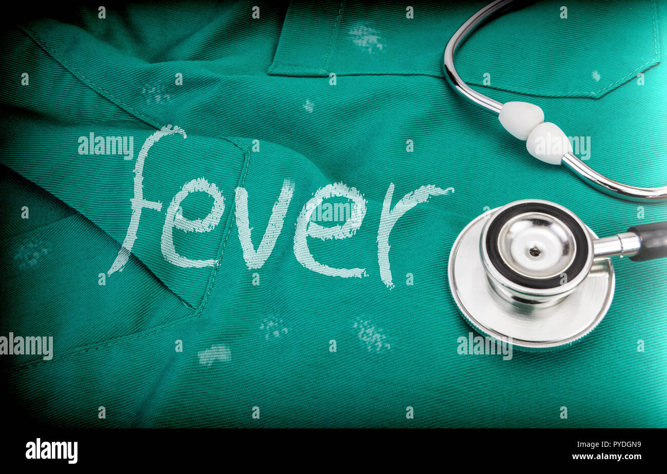 Word fever painted white in medical uniform next to a stethoscope ...