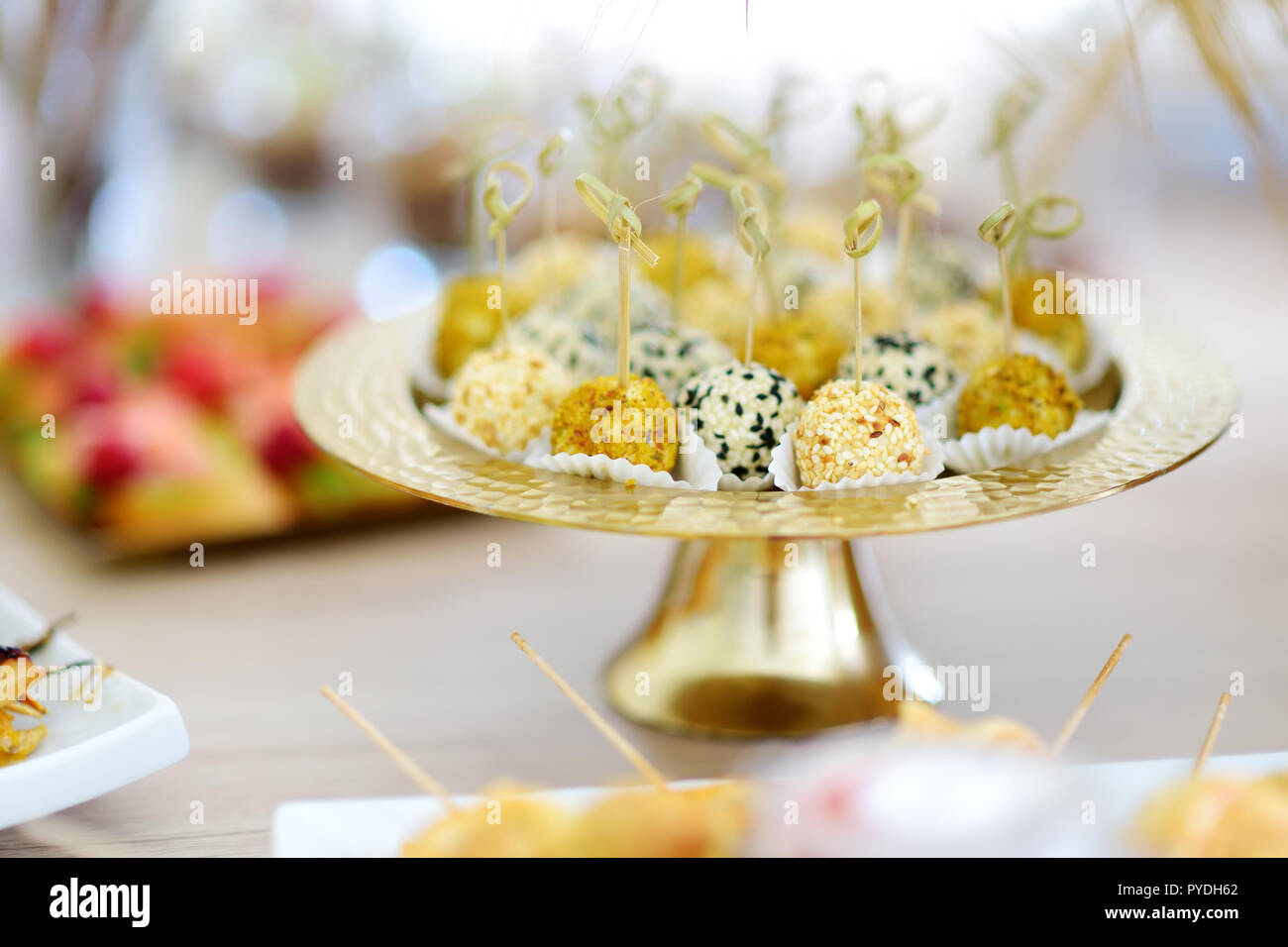 Fresh and delicious various cheese balls served on a party or wedding ...