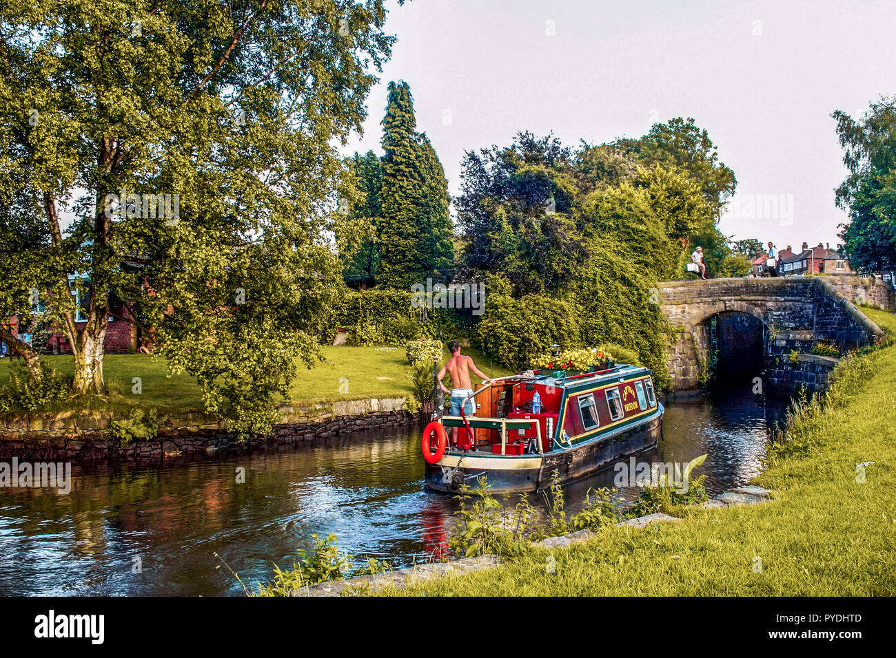 Barges and pleasure craft heading and at top locks on canal at Marple ...