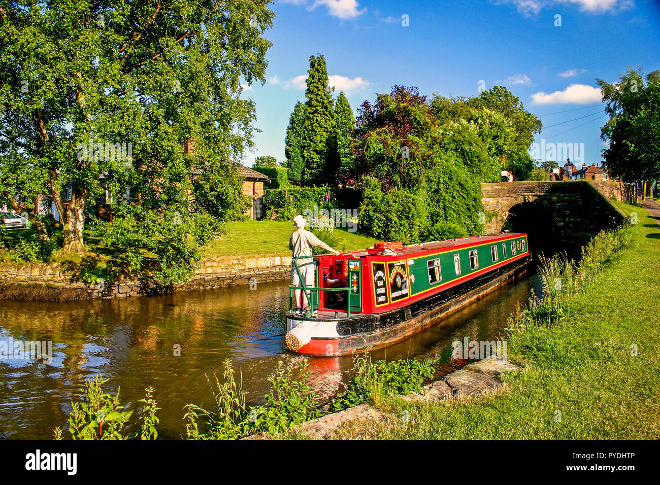 Barges and pleasure craft heading and at top locks on canal at Marple ...