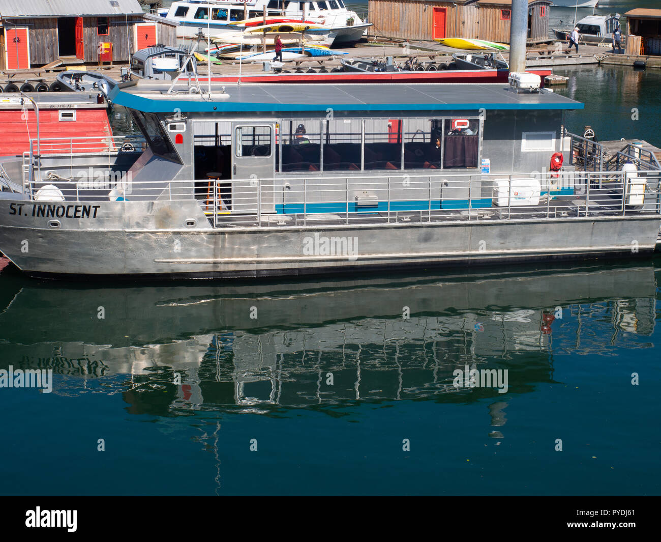 Silver Boat In The Marina Stock Photo - Alamy