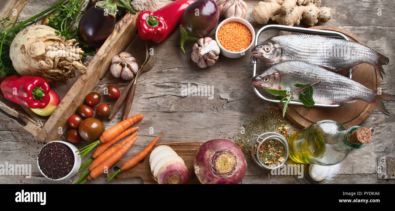 Cooking ingredients on rustic wooden board. Healthy lifestyle and food ...