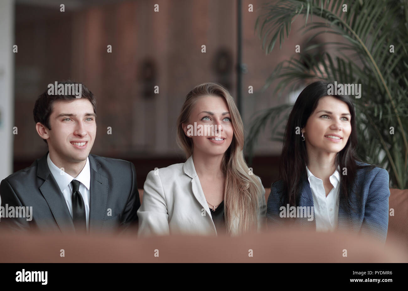 close up. members of successful business team on office background ...