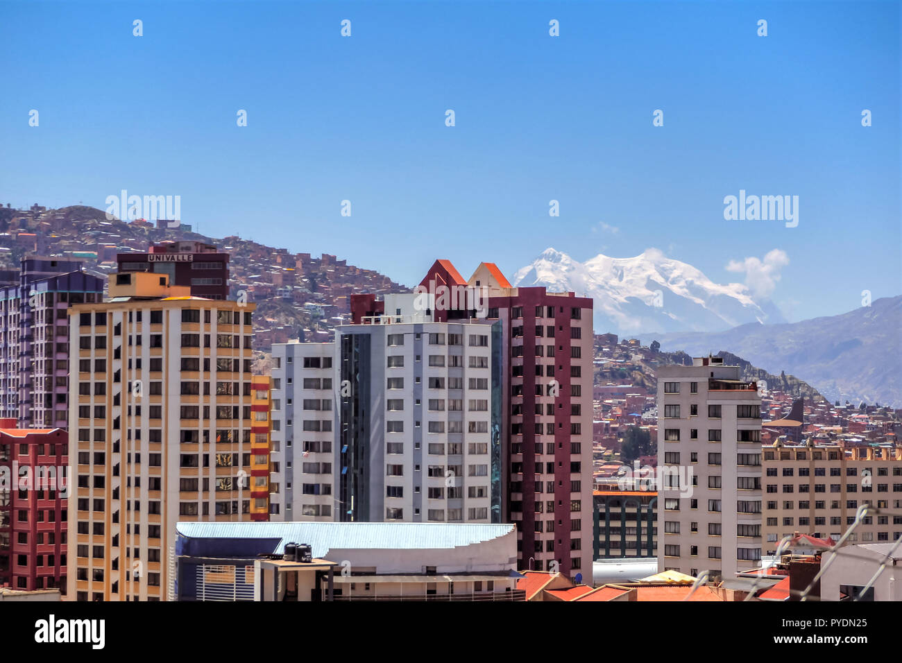 Building and cityscape in La Paz in Bolivia, With snow mountains in the ...