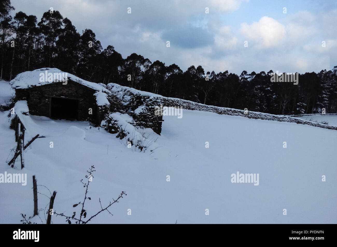 Old house in the snow landscape Stock Photo - Alamy