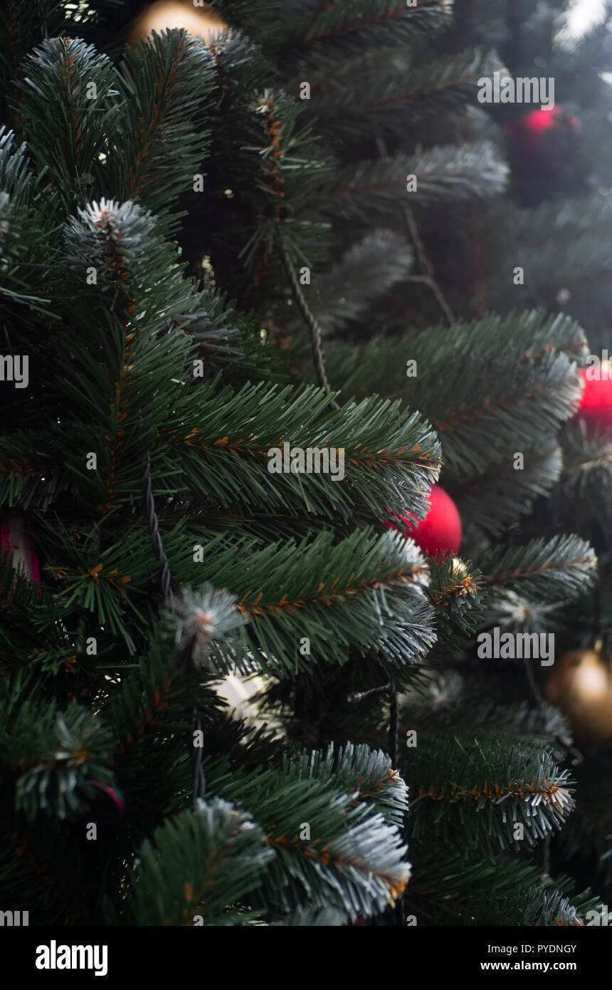 New Year decoration. Christmas background - baubles and branch of ...
