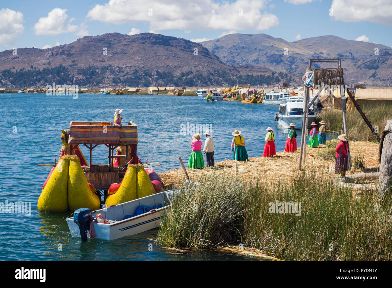 The Uros floating islands in lake Titicaca, Peru. Tipical boat and ...