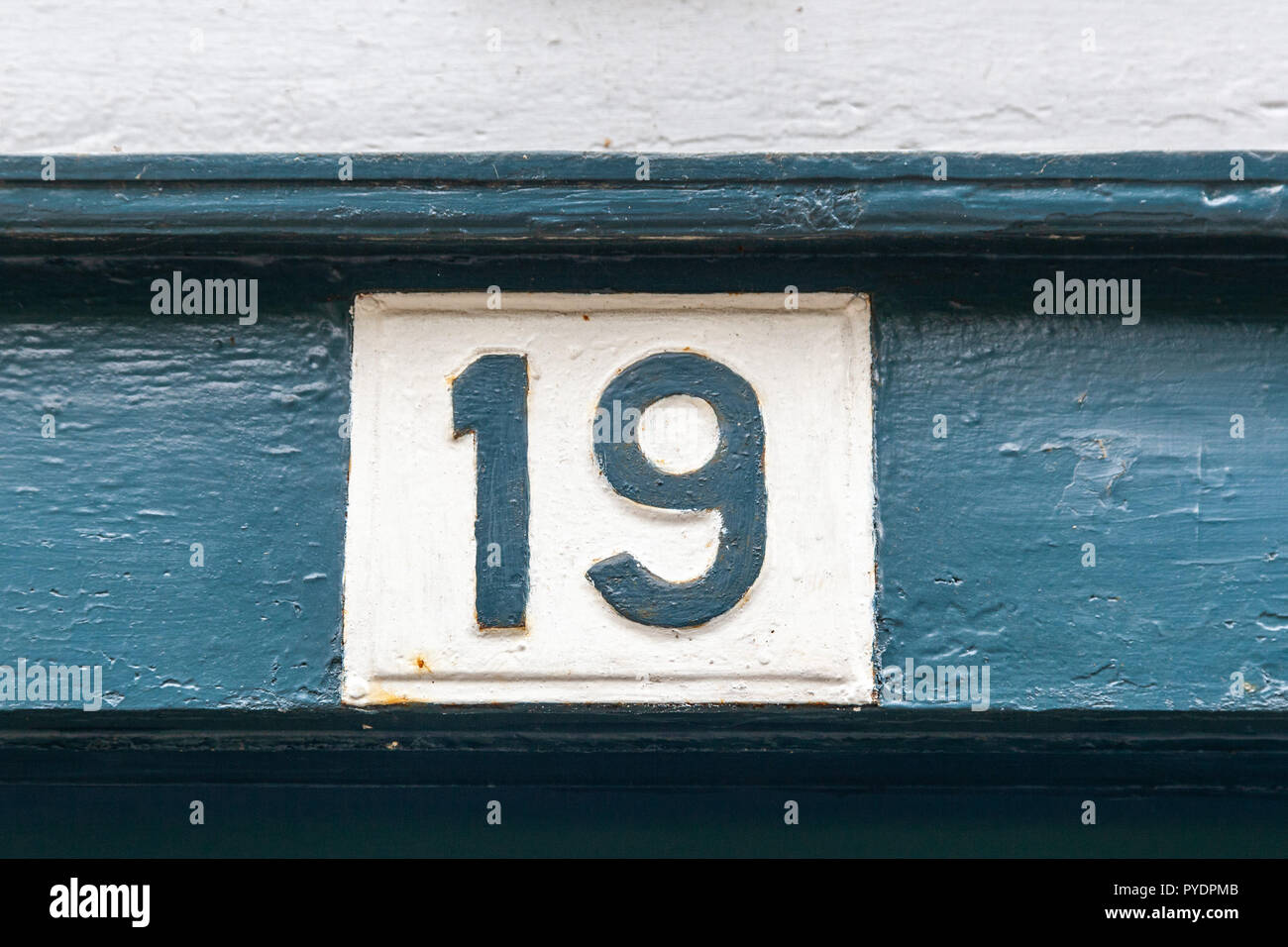 House number nineteen 19 in pressed metal painted white and green from ...