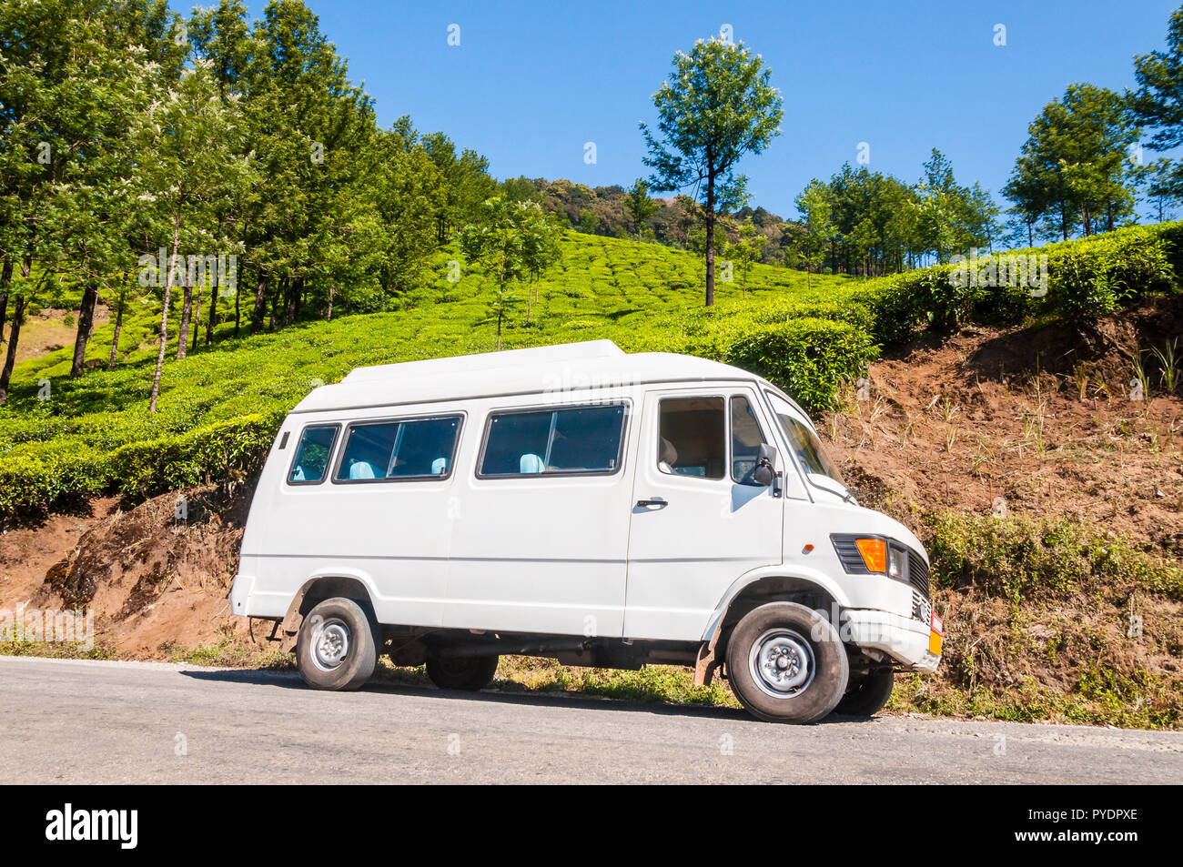 Munnar, Kerala, India - January 14, 2015: The white minibus Mercedes ...