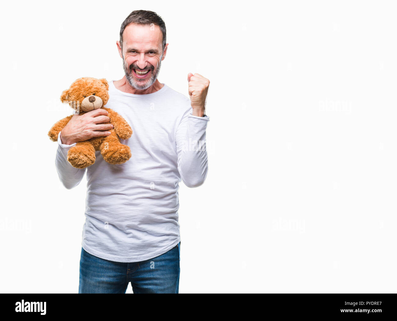 Middle age senior hoary man holding teddy bear over isolated background ...