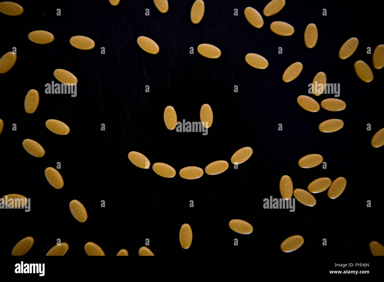 Smiley face pills hi-res stock photography and images - Alamy