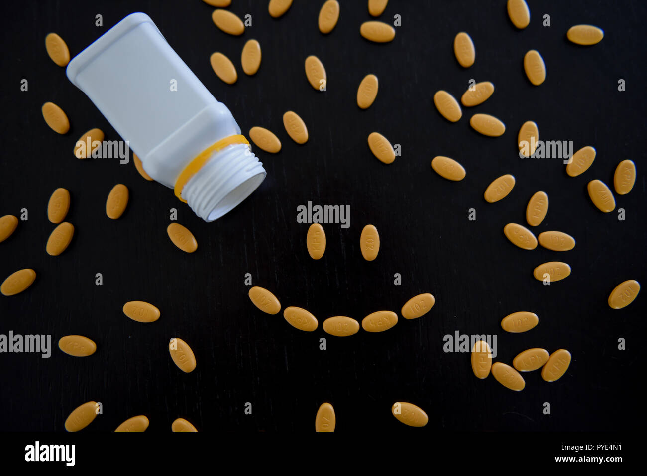 Smiley face pills hi-res stock photography and images - Alamy