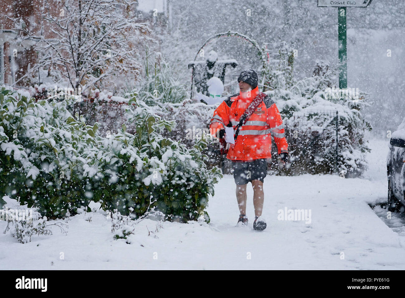 Postman in shorts hi-res stock photography and images - Alamy