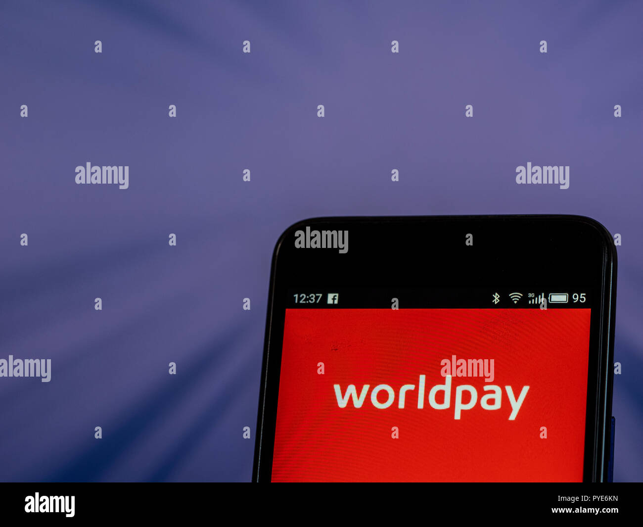 Worldpay Company logo seen displayed on smart phone. Worldpay Group plc ...